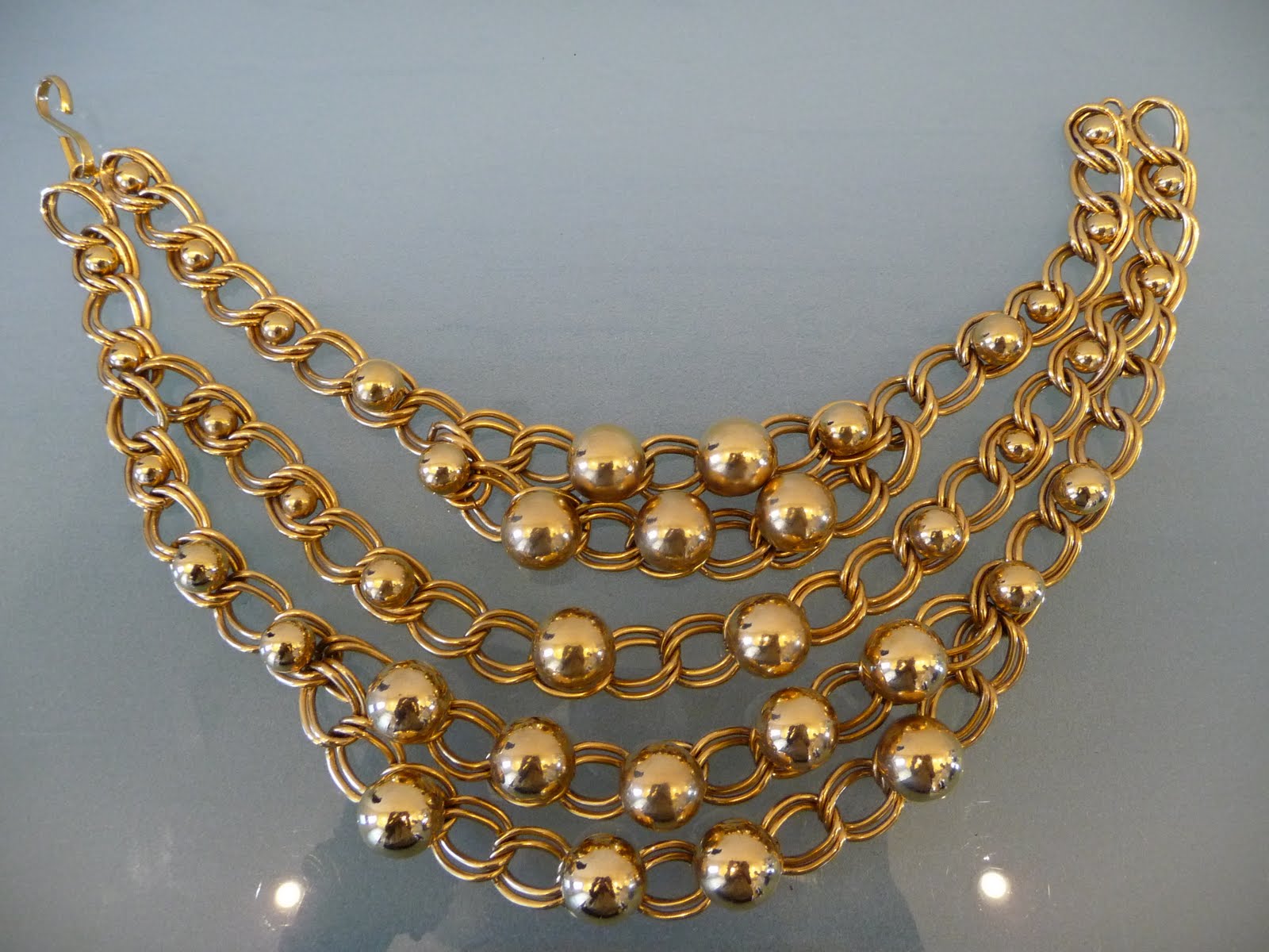 DECADES INC.: Golden Bib