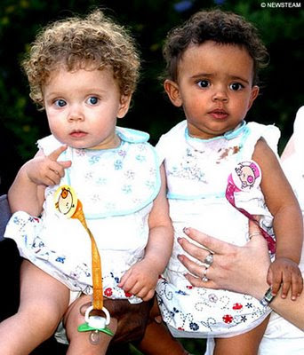 Another Pale Blue Dot: Twins from different races...