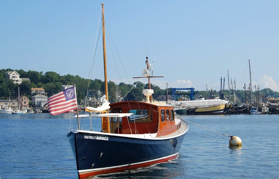 Another long & lean Phil Bolger boat home-built and launched somewhere ...