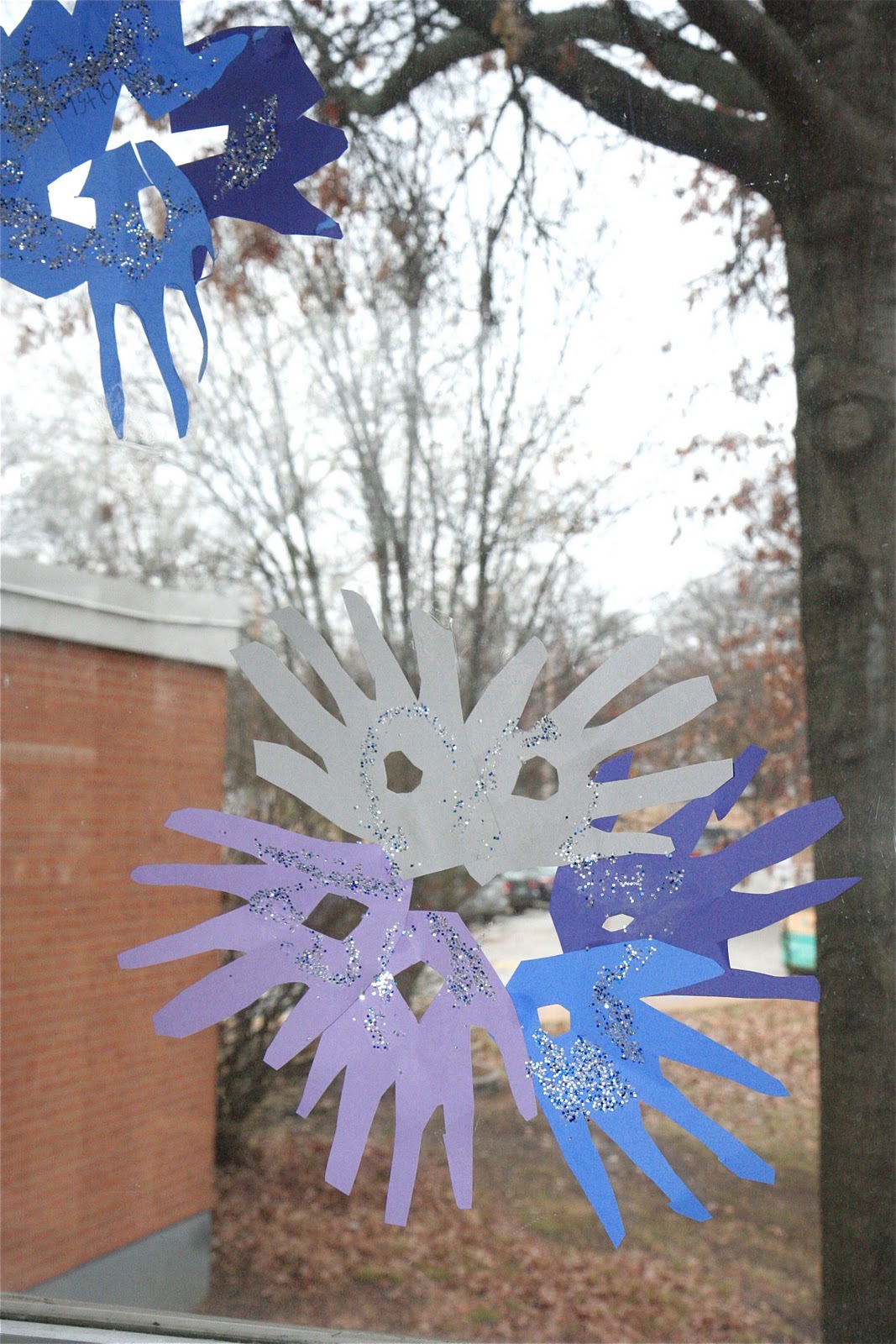 Splish Splash Splatter: Handprint Snowflakes