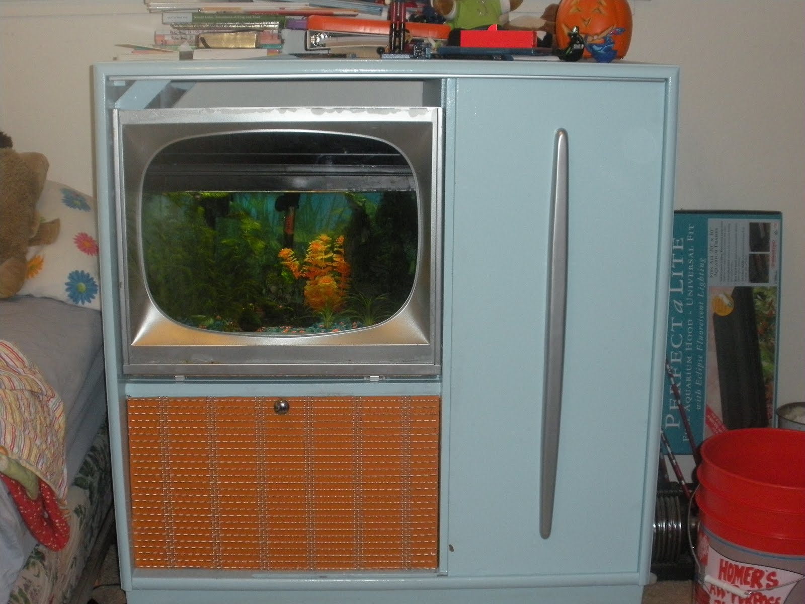 Jacob's Junk: Old 60's t.v. and radio console, to funky fish tank stand...