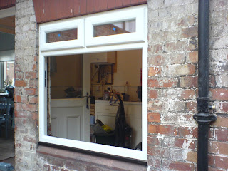 Haworth Carpentry & Joinery: UPVC Windows with black 90mm stub cill.