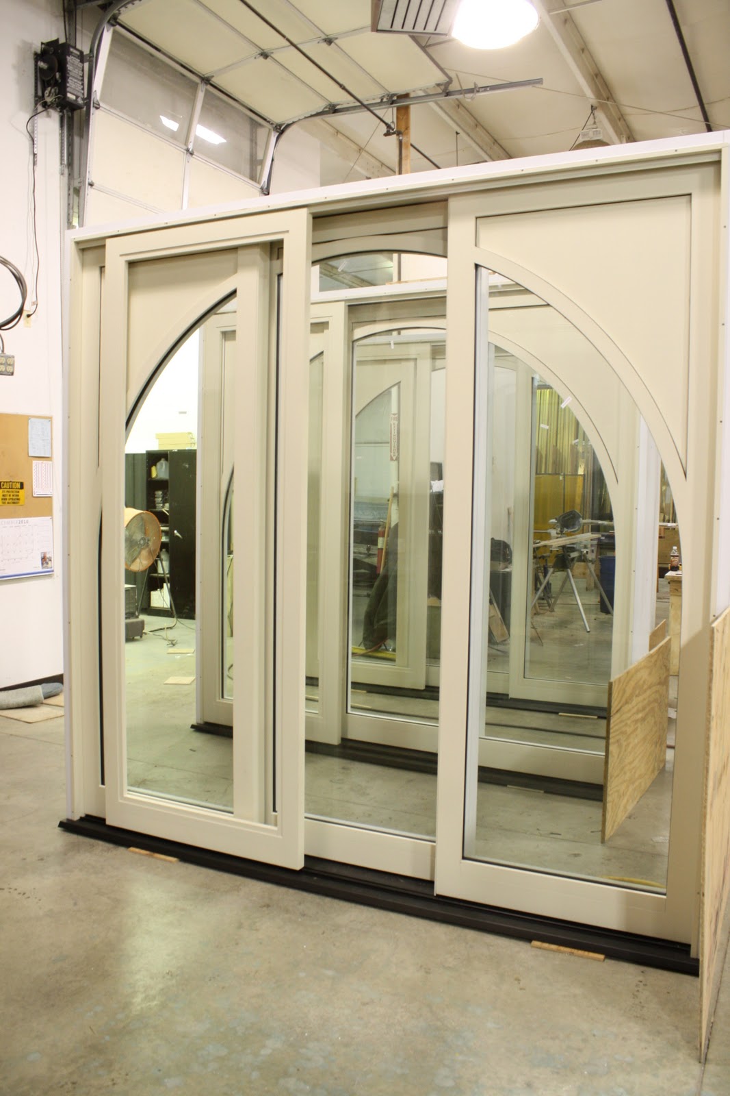 Grabill Windows and Doors: Arched Lift and Slide Doors
