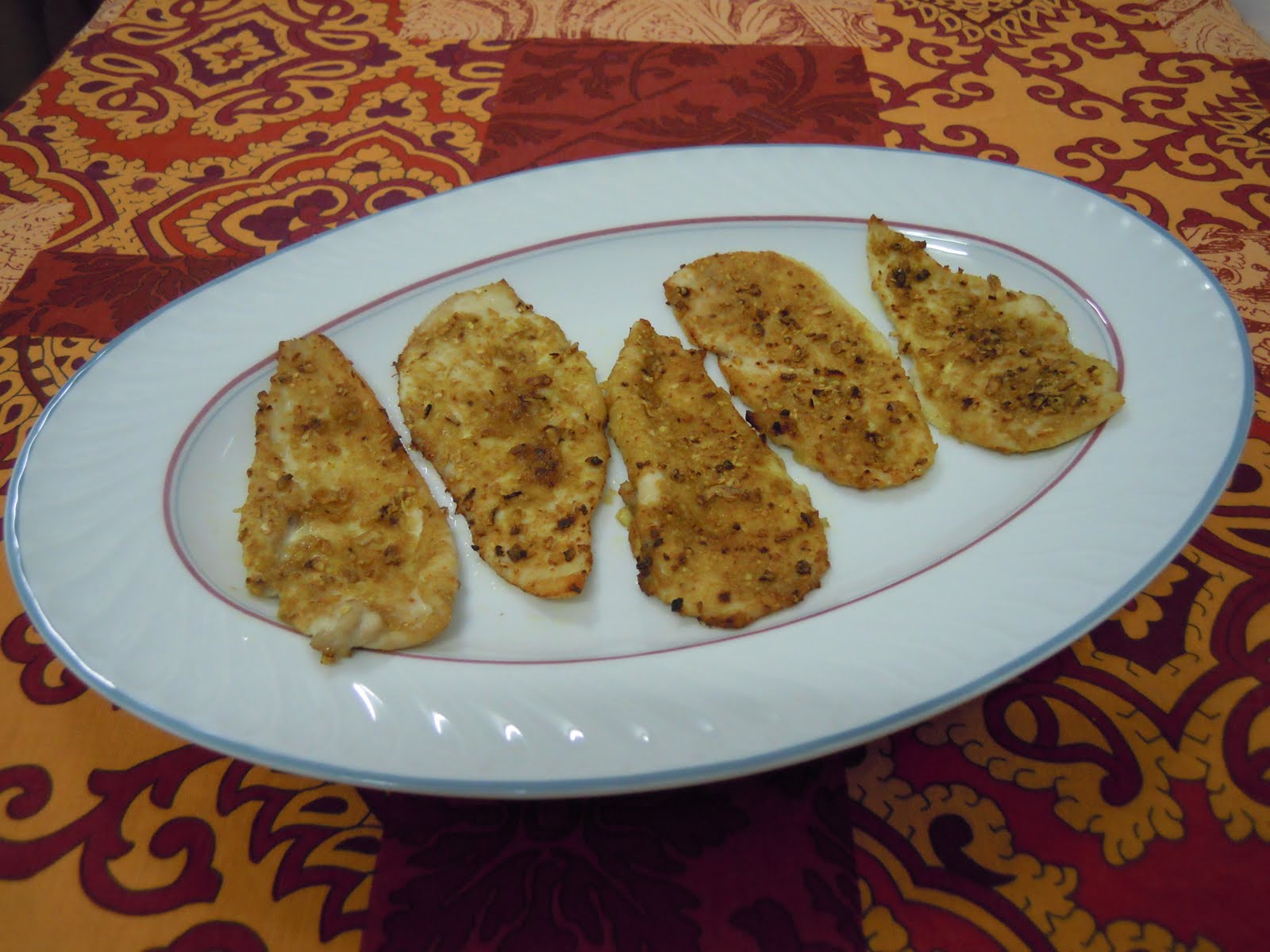 Pechugas rebozadas con sopa de cebolla
