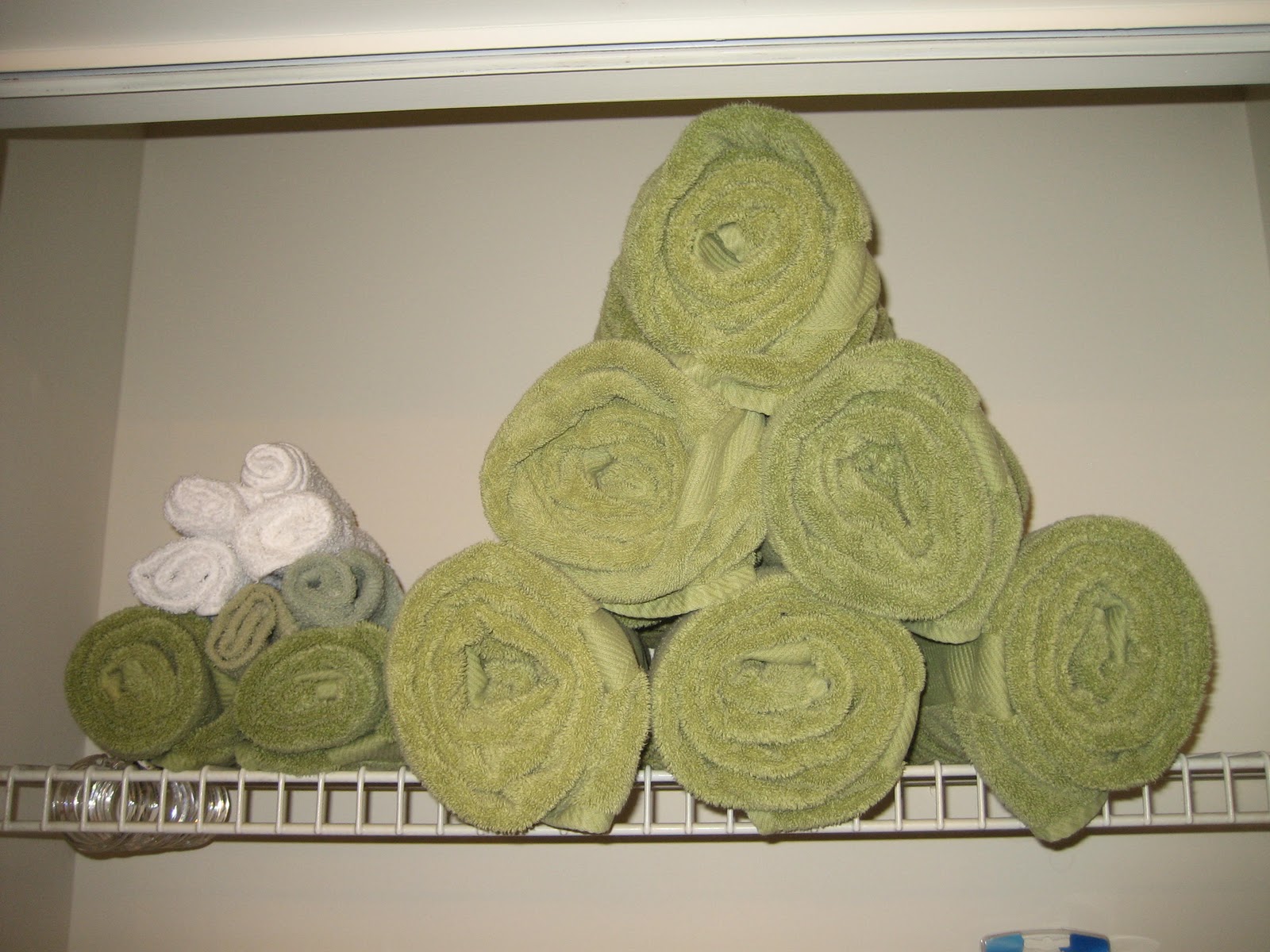 31 diy: Bathroom closet reorganized to be functional and pretty