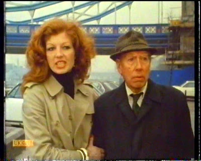 Trenchcoated: Rula Lenska dons a classic Burberry in an early '80s ...