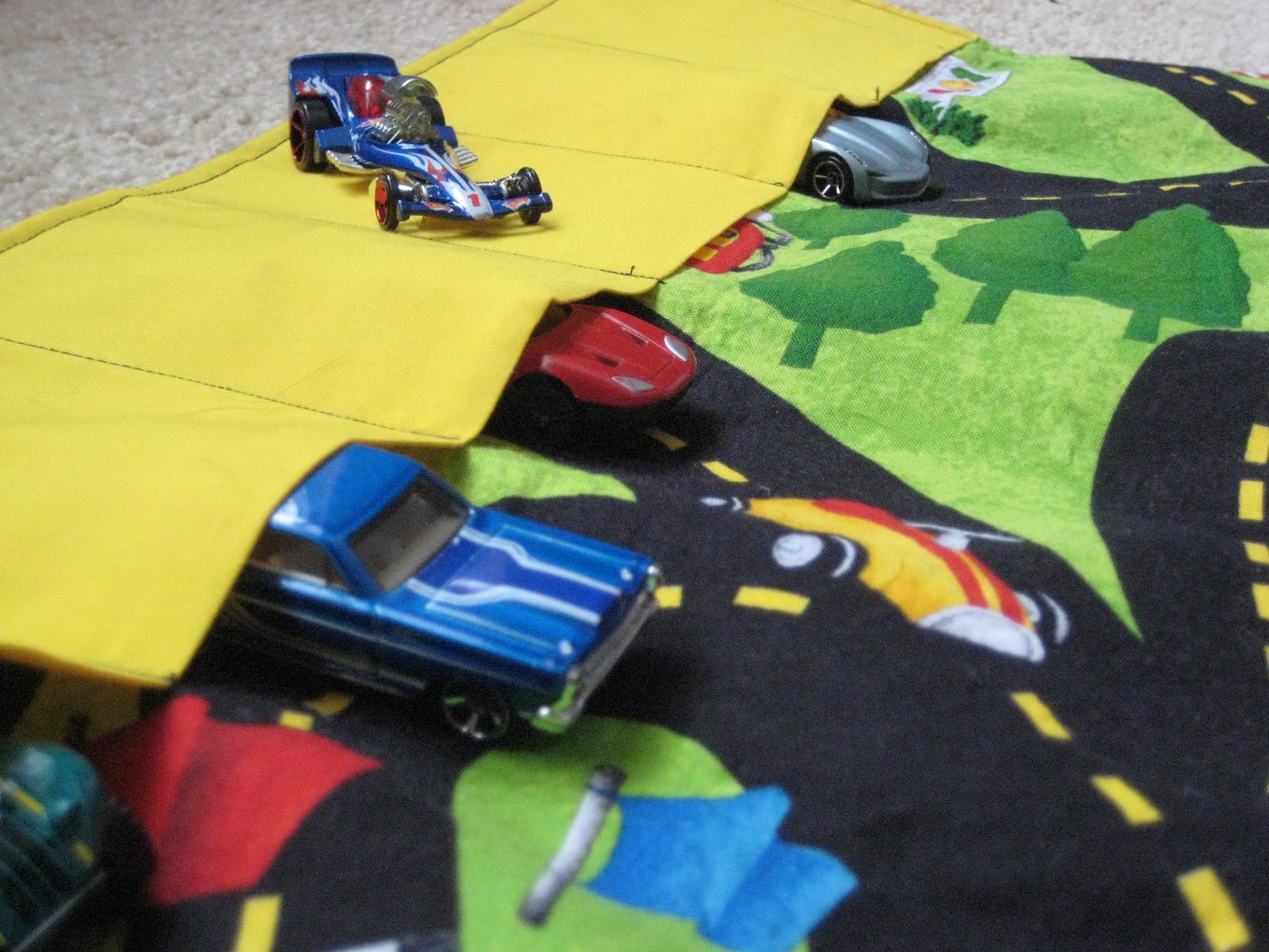 in simplest form •: road playmat