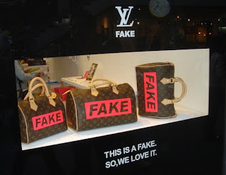 Kay: fake, counterfeit, mock, phony, artificial, bogus...