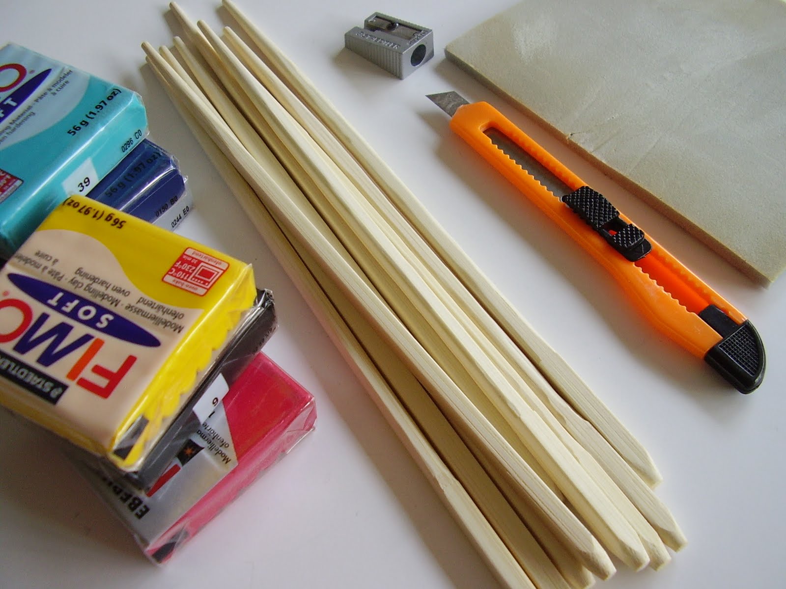 Making spindles with chopsticks & fimo.