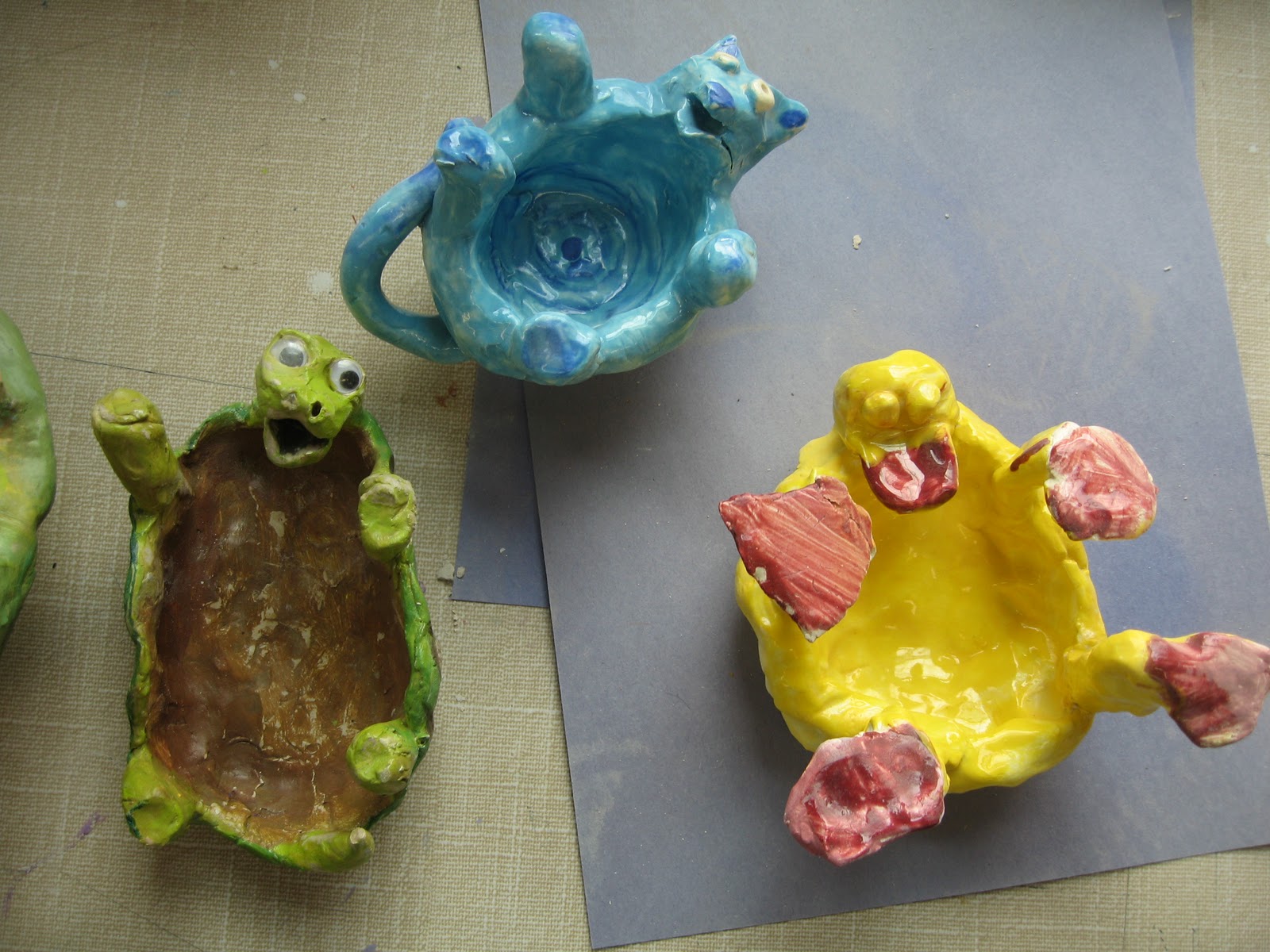 Color, collage, and much more: Funny Pinch Pot Characters