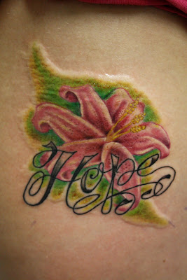 Larsons Creative Concepts: hip tattoo :: flower & script