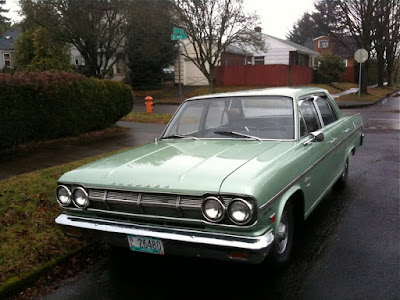 OLD PARKED CARS.: 1965 AMC Rambler Classic 550 Sedan.