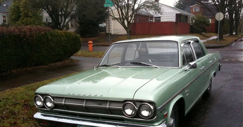 OLD PARKED CARS.: 1965 AMC Rambler Classic 550 Sedan.