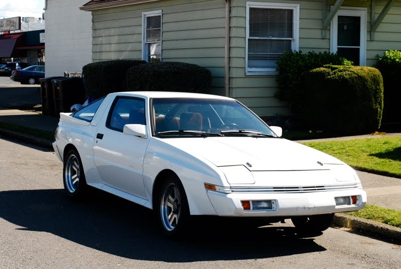 OLD PARKED CARS.: Badgeless 1987 Mitsubishi Starion ESI-R Coupe.