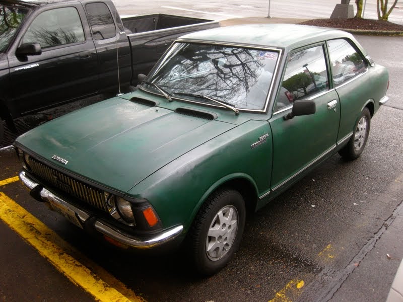 OLD PARKED CARS.: 1972 Toyota Corolla Sedan.