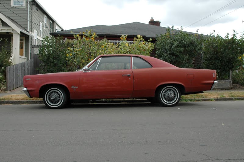 OLD PARKED CARS.: 1967 Rambler Rebel 550 Hardtop.