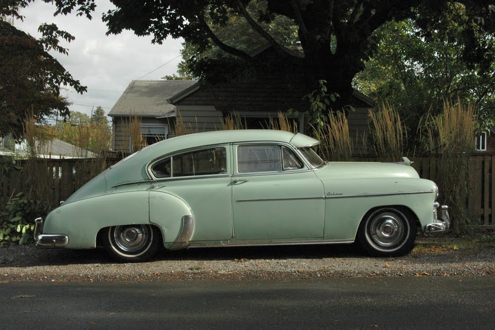 OLD PARKED CARS.: 1950 Chevrolet Deluxe Fastback.