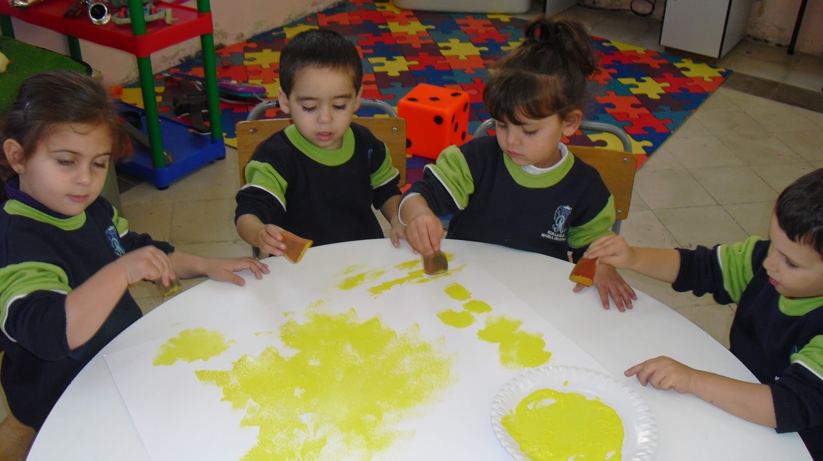 Ms. Charlene's class: Sponge printing to make a star