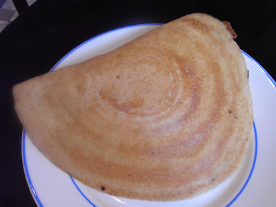 Best side dish would be some tangy side dish like Tomato Chuttney ...