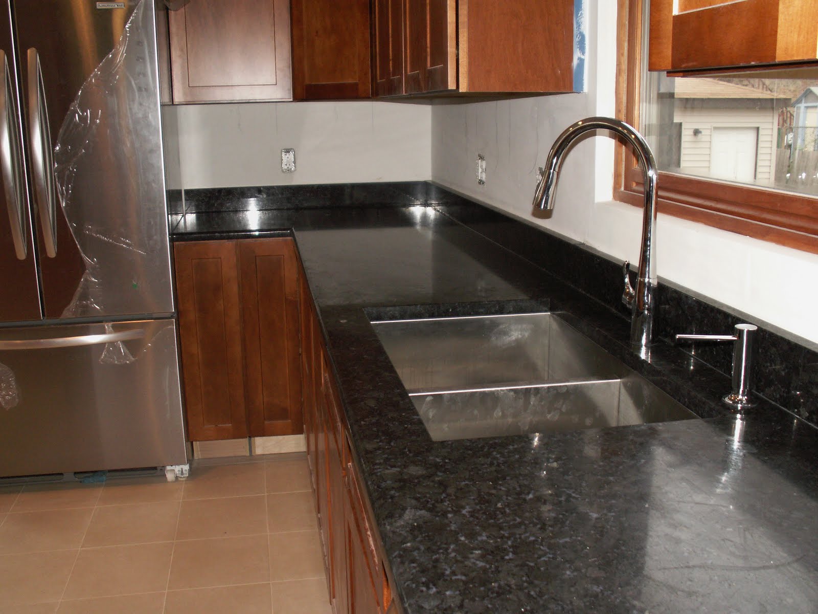 JC Granite: Amazone Blue Star with Granite all the way to the ceiling ...