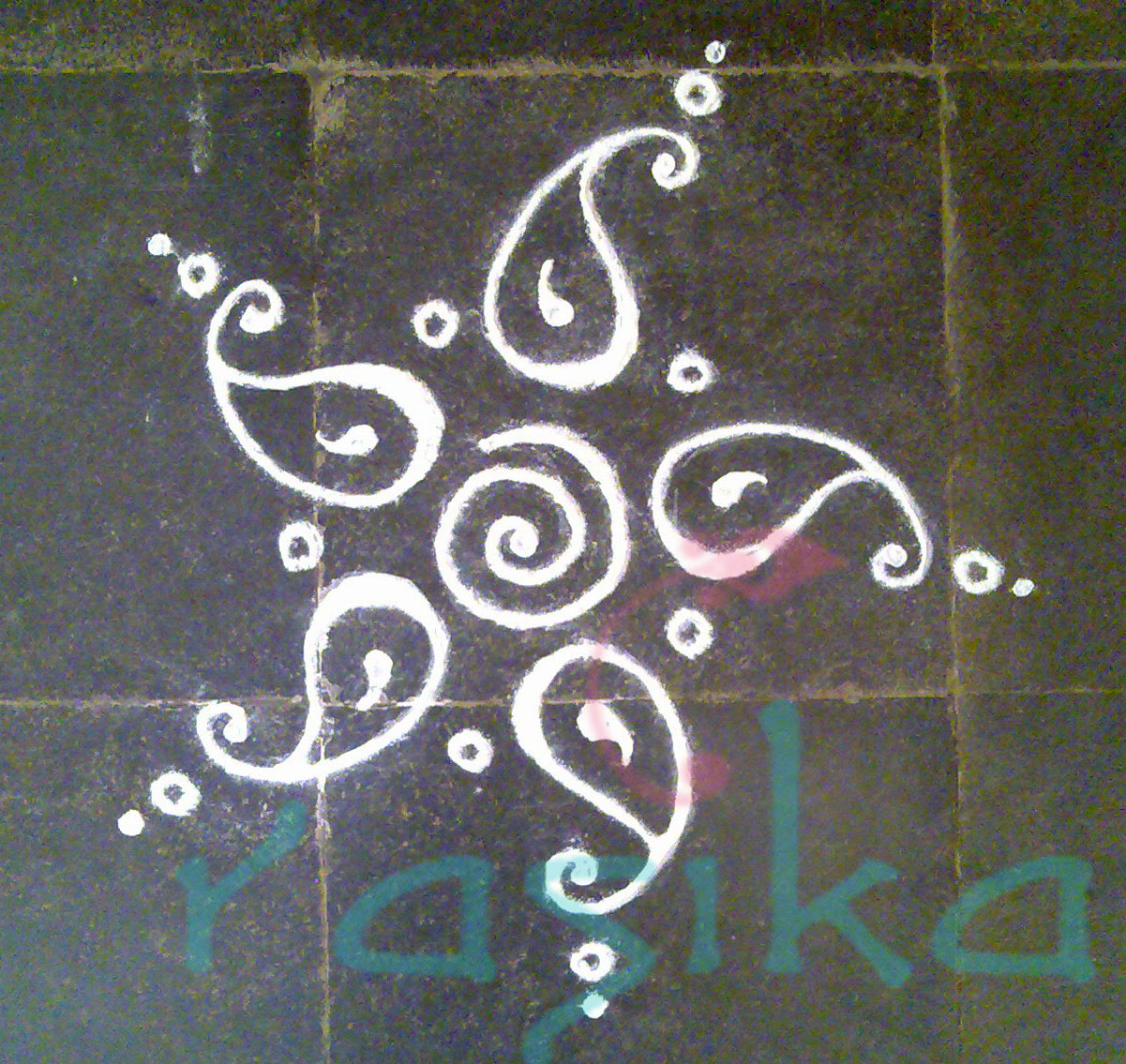 rasika: Simple white rangoli design