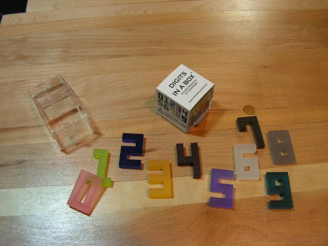 Brian's Damn Puzzle Blog: Mirrorkal Escher and Digits in a Box
