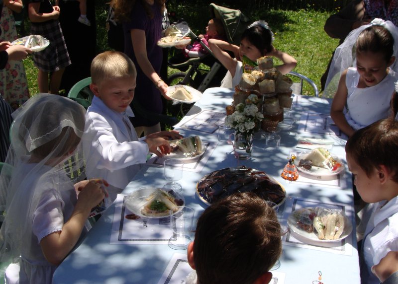 Under Her Starry Mantle: First Holy Communion on Beatification Day