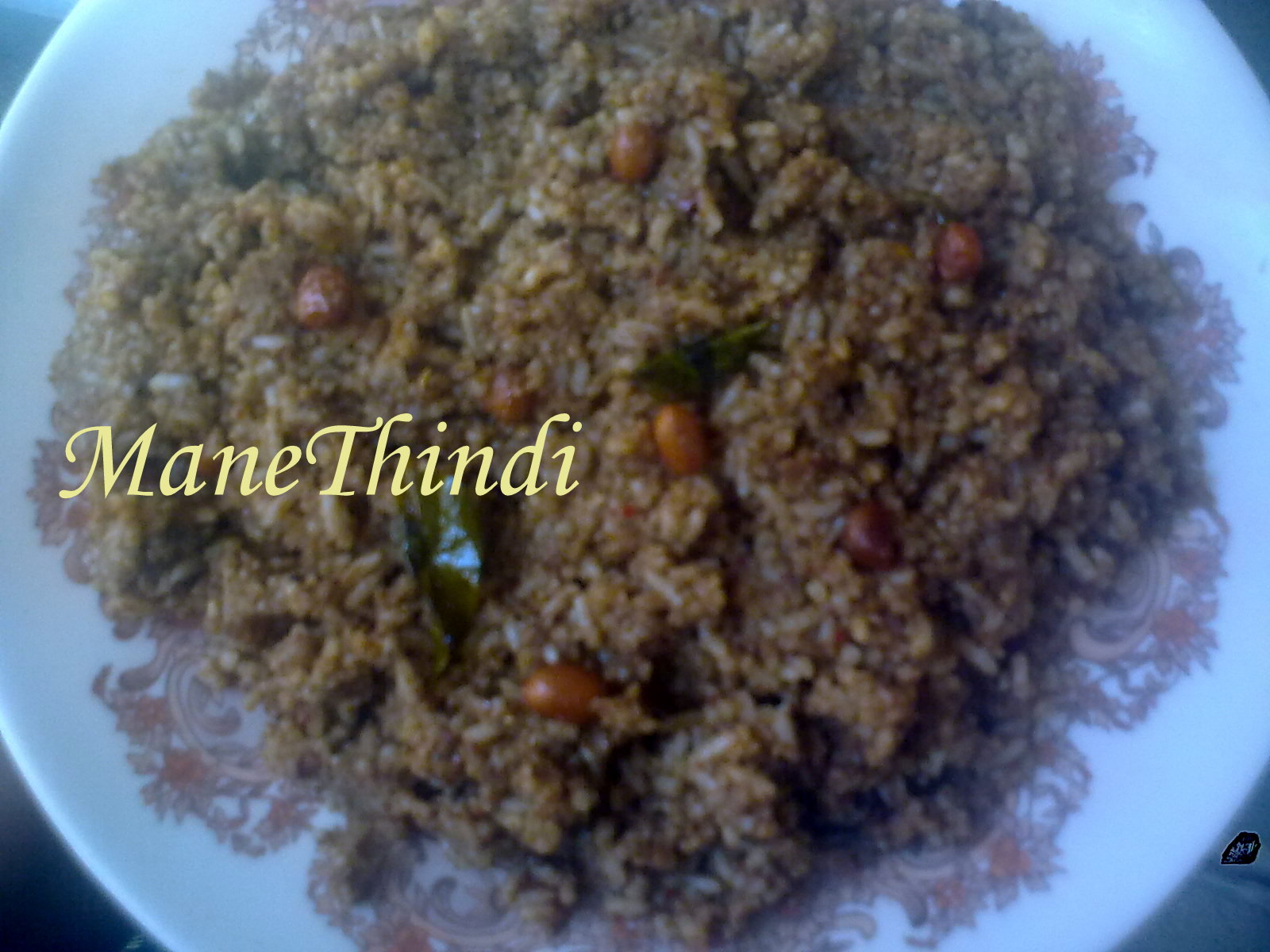 PULIYOGARE GOJJU RICE