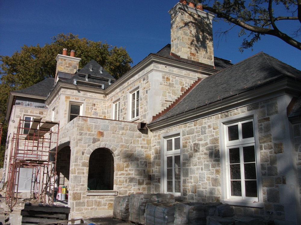 Limestone & Boxwoods: A Stone French Manor In Lake Forest