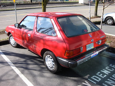 OLD PARKED CARS.: 1985 Subaru STD 3-Door Hatchback.