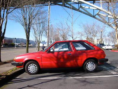 OLD PARKED CARS.: 1985 Subaru STD 3-Door Hatchback.
