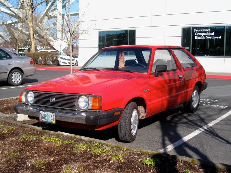 OLD PARKED CARS.: 1985 Subaru STD 3-Door Hatchback.