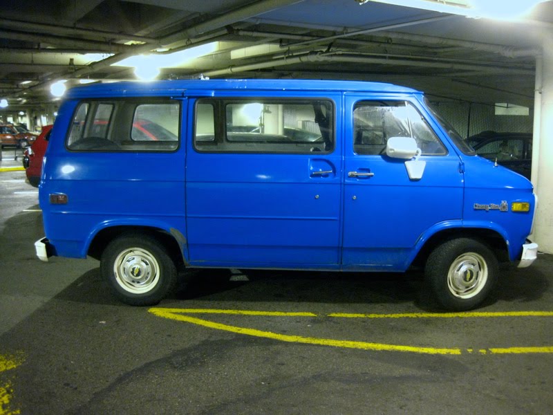 OLD PARKED CARS.: 1980 Chevrolet G10 Van.