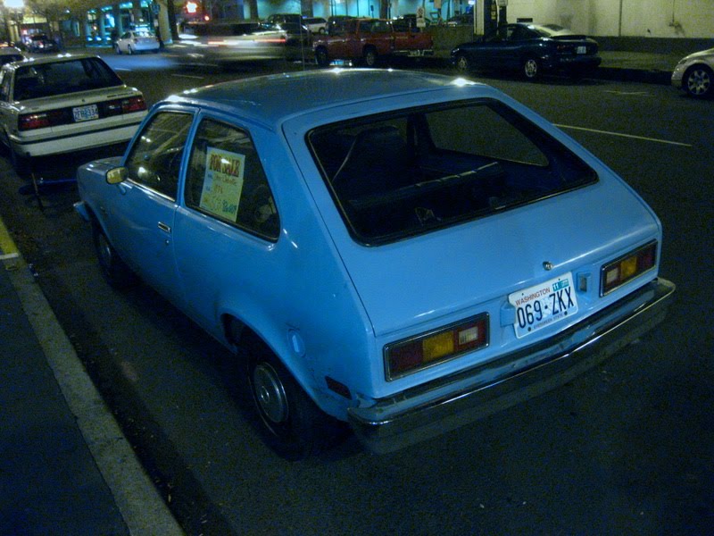 OLD PARKED CARS.: 1977 Chevrolet Chevette Hatchback.