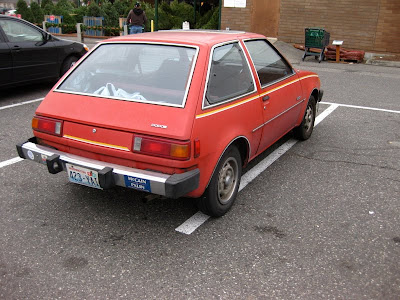 OLD PARKED CARS.: 1979 Dodge Colt Hatchback.