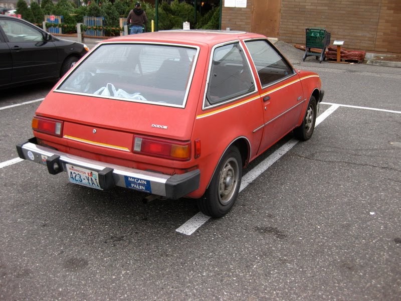 OLD PARKED CARS.: 1979 Dodge Colt Hatchback.