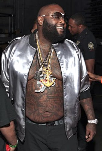 Exclusive Game: RICK ROSS WEARING METALLIC SATIN JACKET BY EXCLUSIVE ...