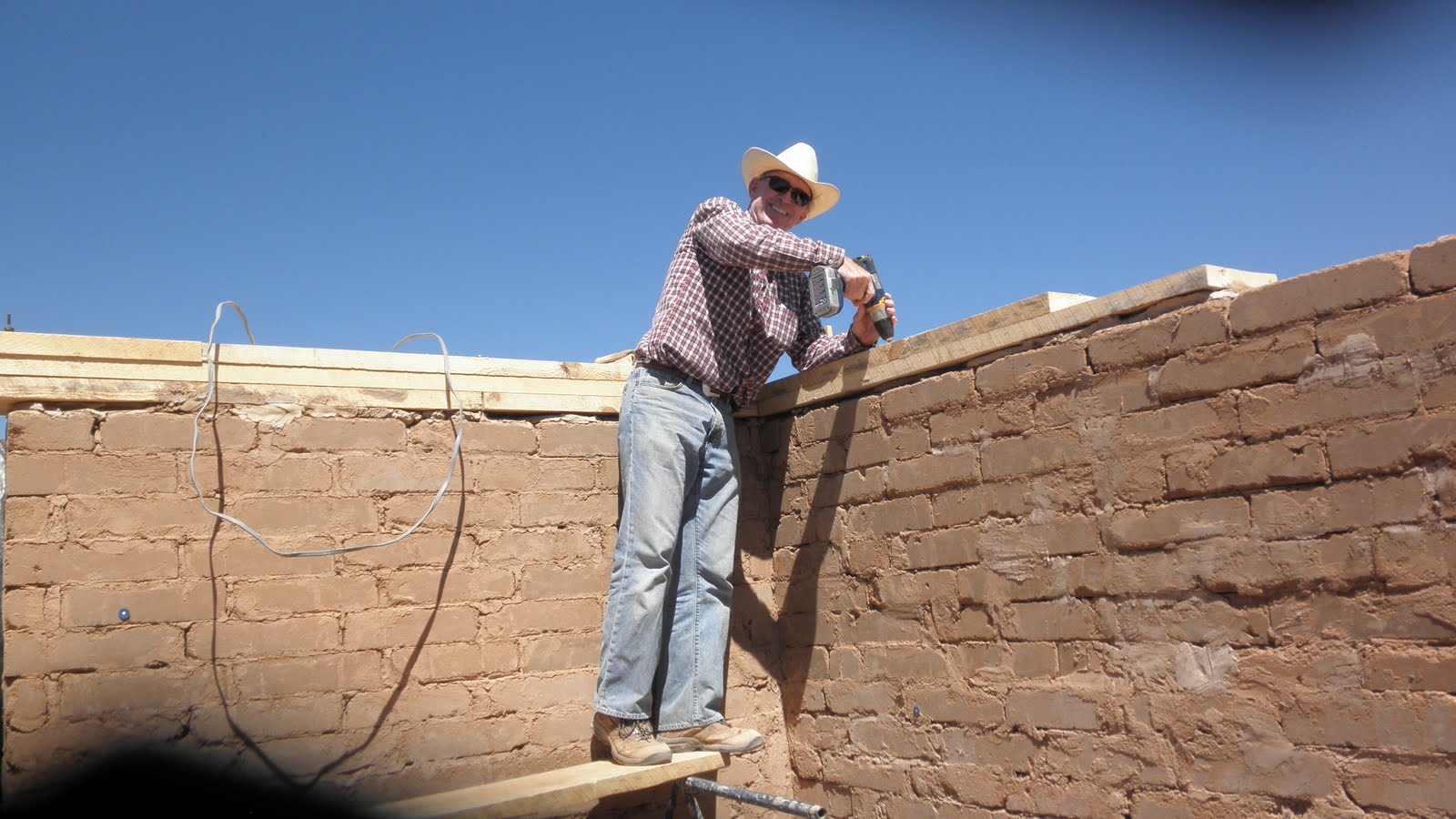 Building our Adobe Home: Bond Beams and Door Bucks.