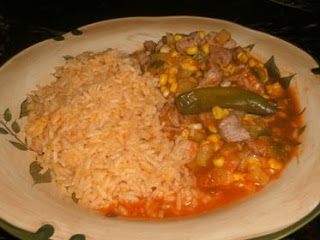 Carne puerco, calabacita y elote
