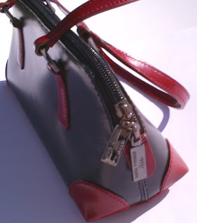 SuziQ's It's A Charmed Life: An Authentic Daniela Moda Leather Handbag ...