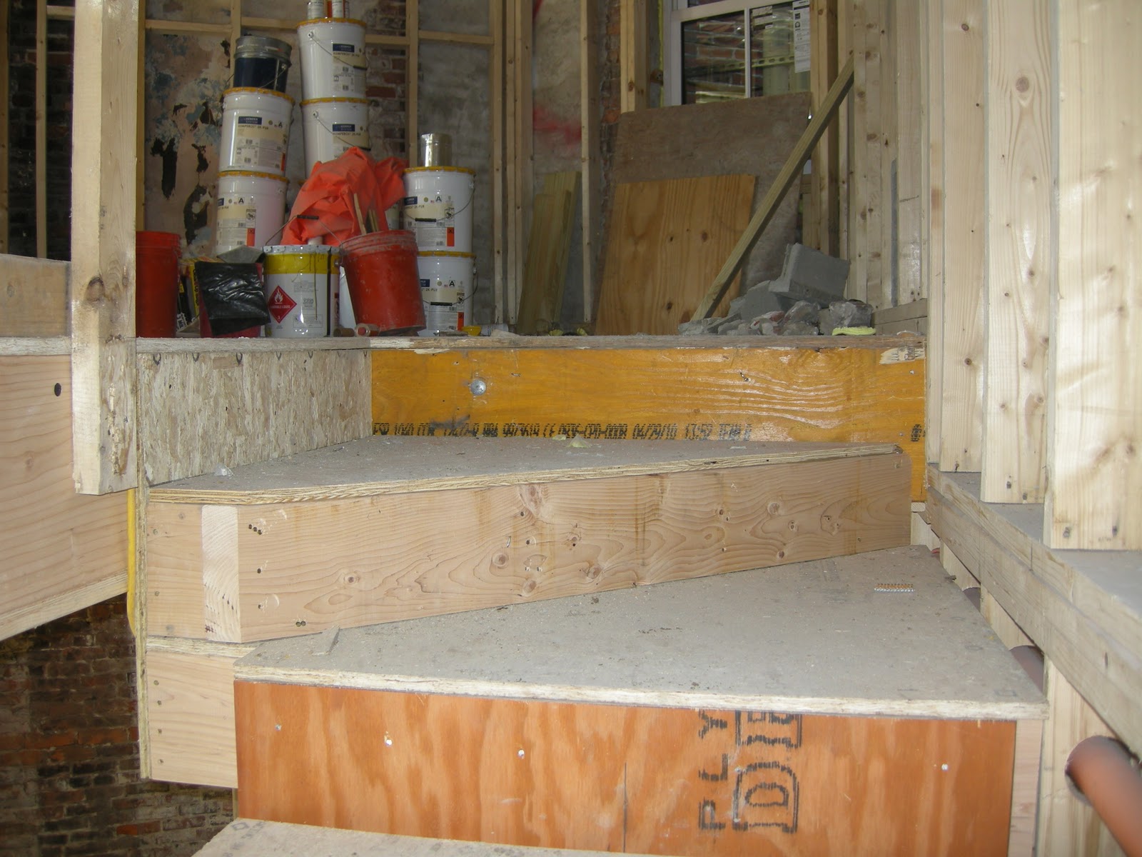 redbrickbuilding: Staircase framing begins in our unit