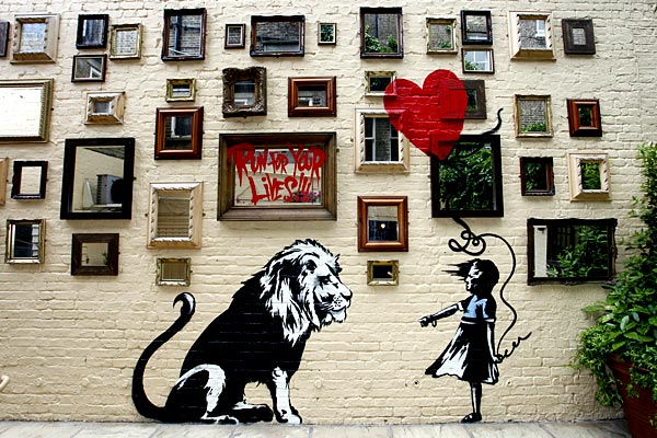 The Black Sheep Dances: Run for your lives! Mural by Banksy