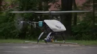 UAV Flying Minicopter with Robotic Hand | NextBigFuture.com