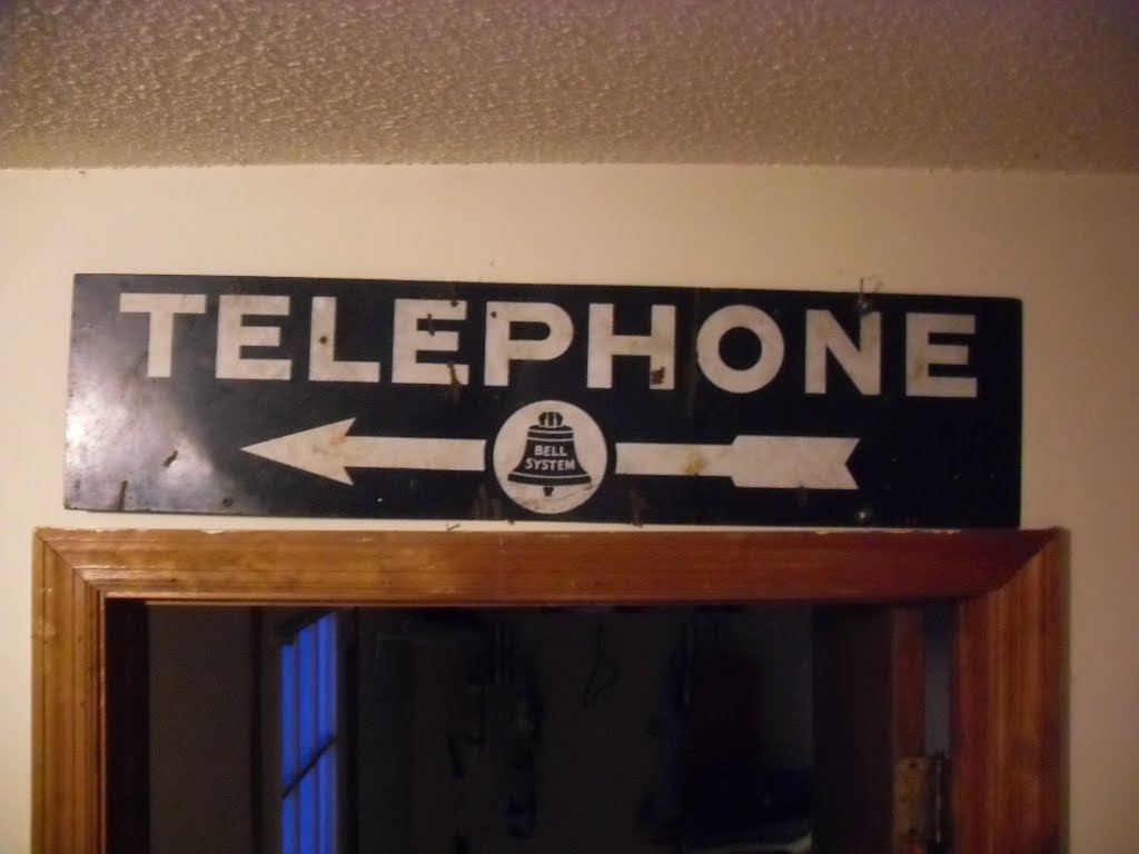 crazyredheadtravels: Vintage Telephone sign