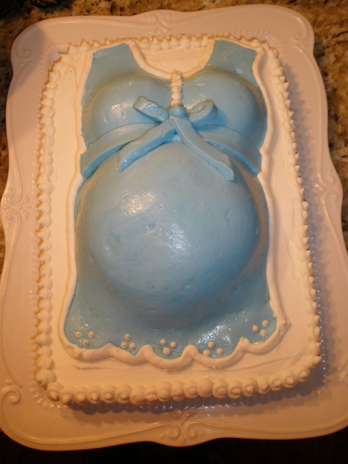 have your cake... and eat it too: pregnant belly cake