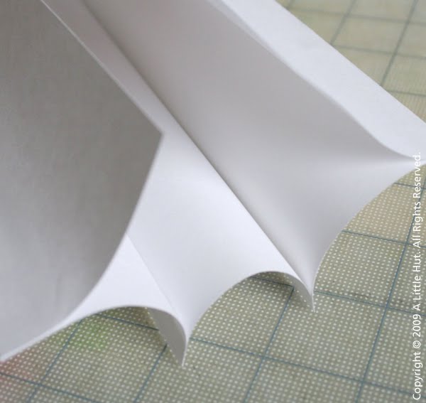 A Little Hut - Patricia Zapata: simple paper hurricane cover