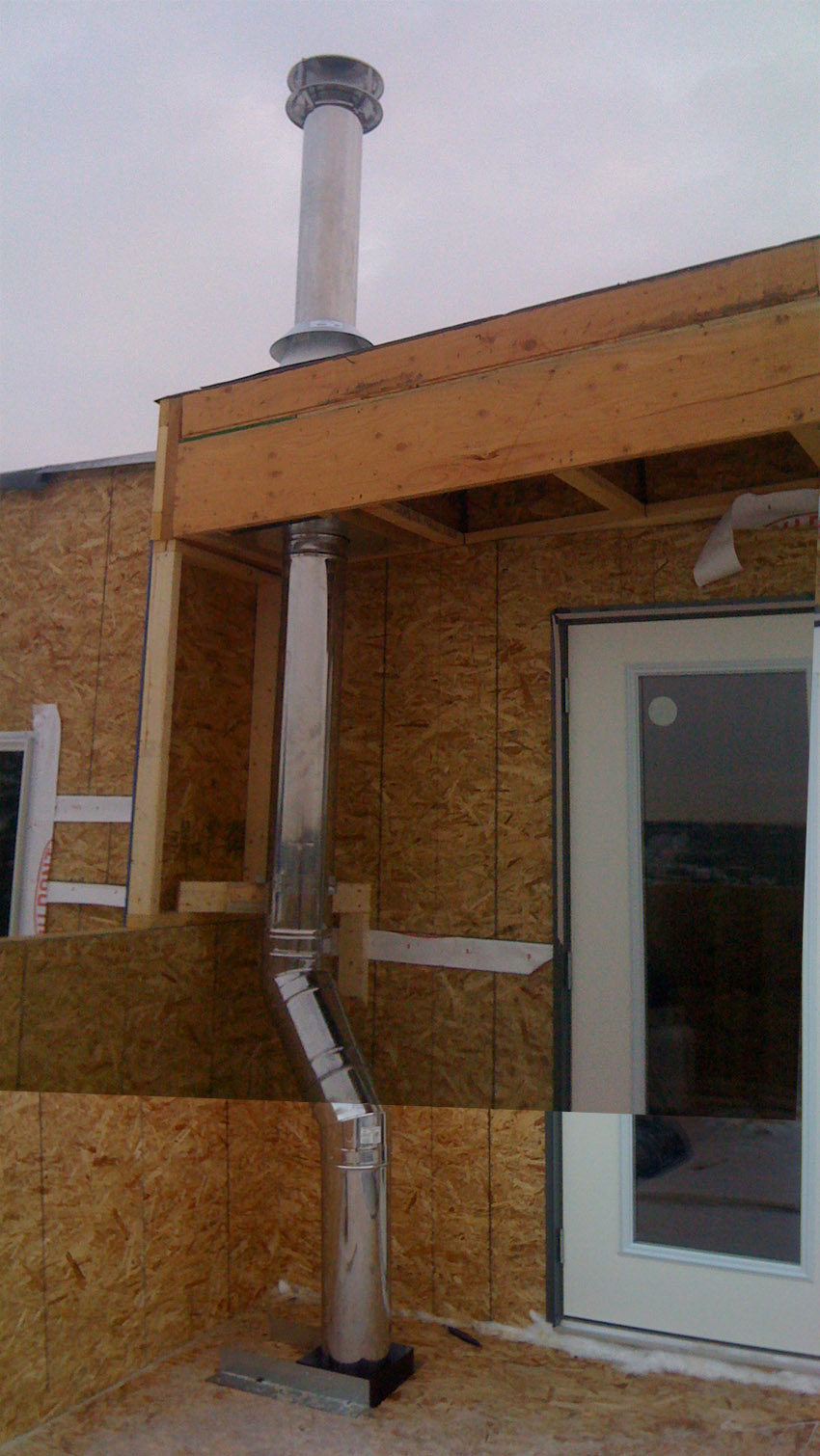 Chasing Net Zero: Chimney installed!