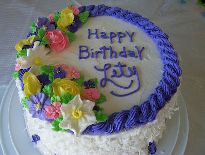 Desserts By Request: Coconut Cake - 9 in. round with Royal Icing Flowers