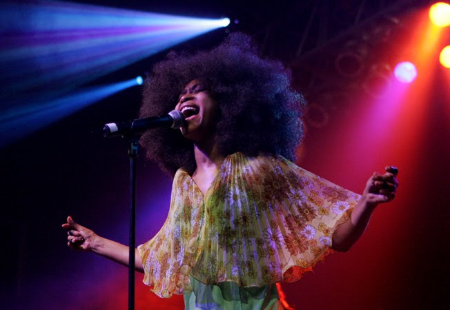 World News Blog: The Erica Badu Strips on Window Seat