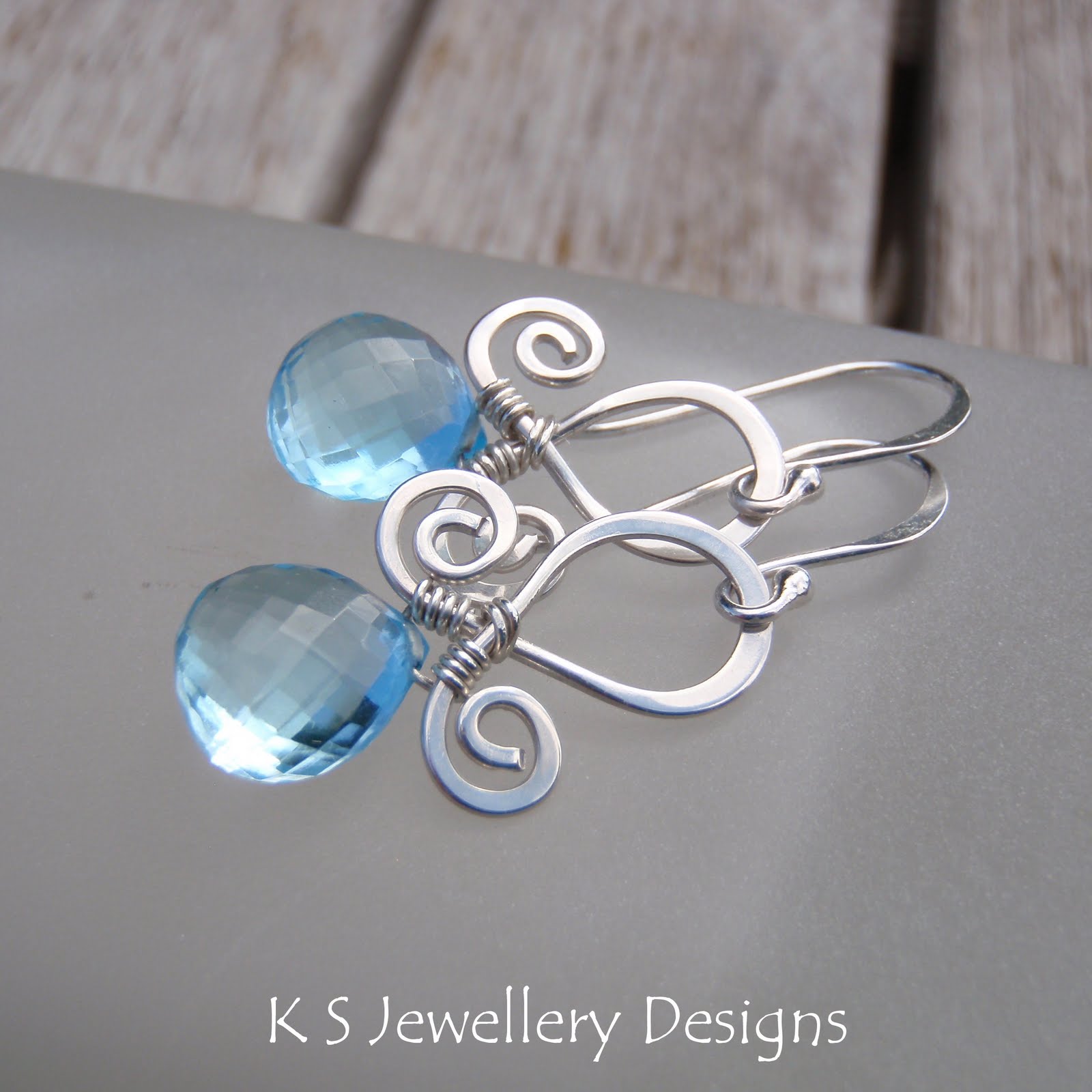 K S Jewellery Designs: Blue Topaz Swirl Loop Earrings
